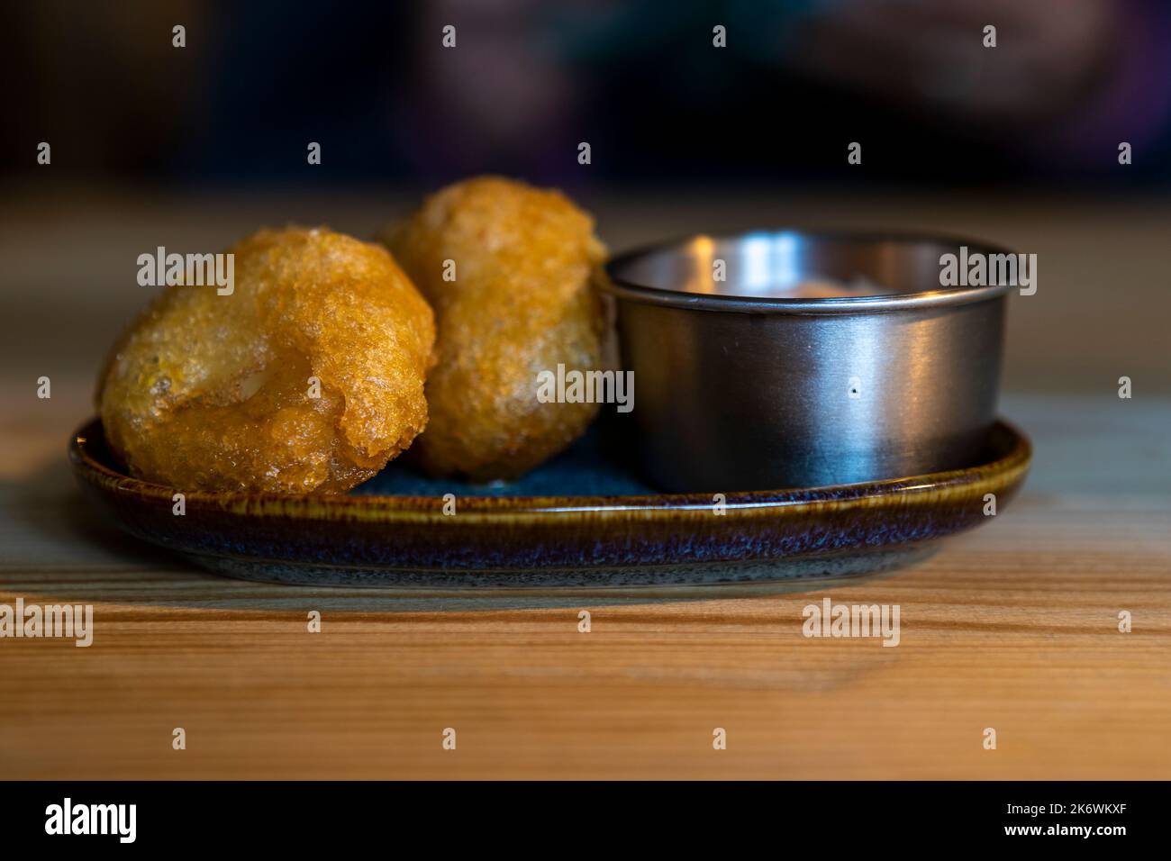 Scallop fritters with a specy dip. Tasty entree served at THe Bell at ...