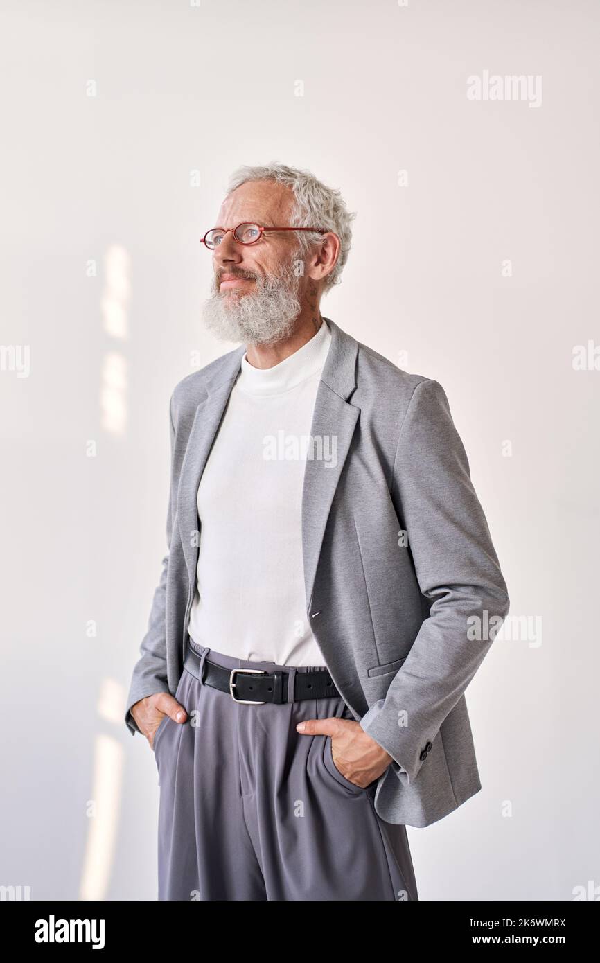 Thoughtful senior older business man looking away isolated on white ...