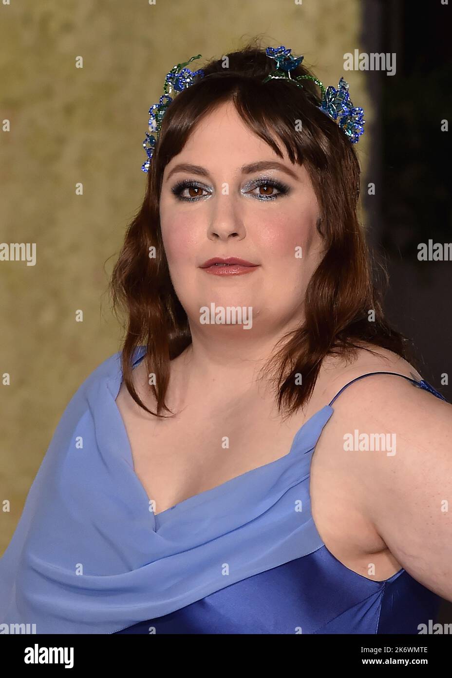 Lena Dunham walking the red carpet at the Second Annual Academy Museum ...
