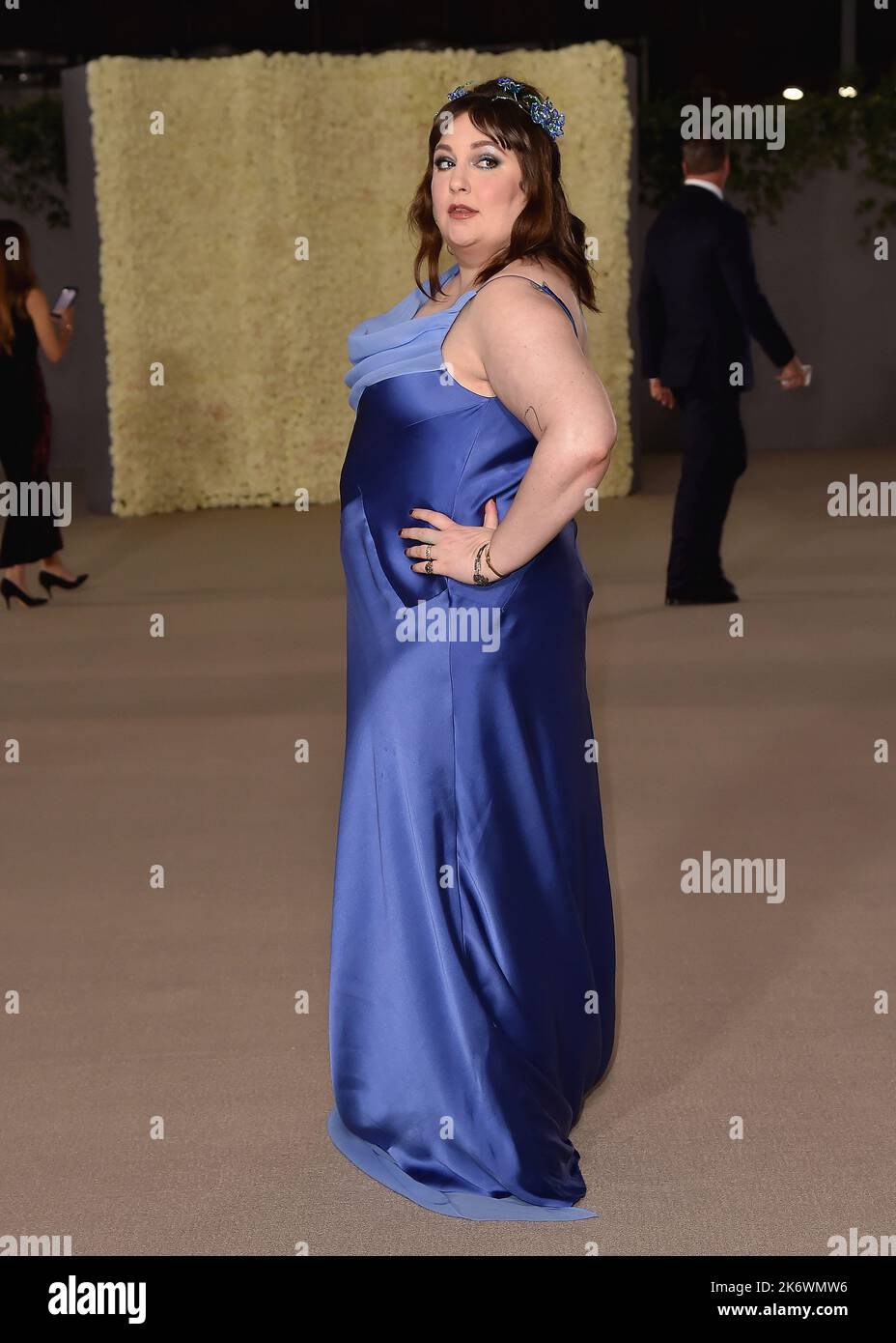 Lena Dunham walking the red carpet at the Second Annual Academy Museum ...