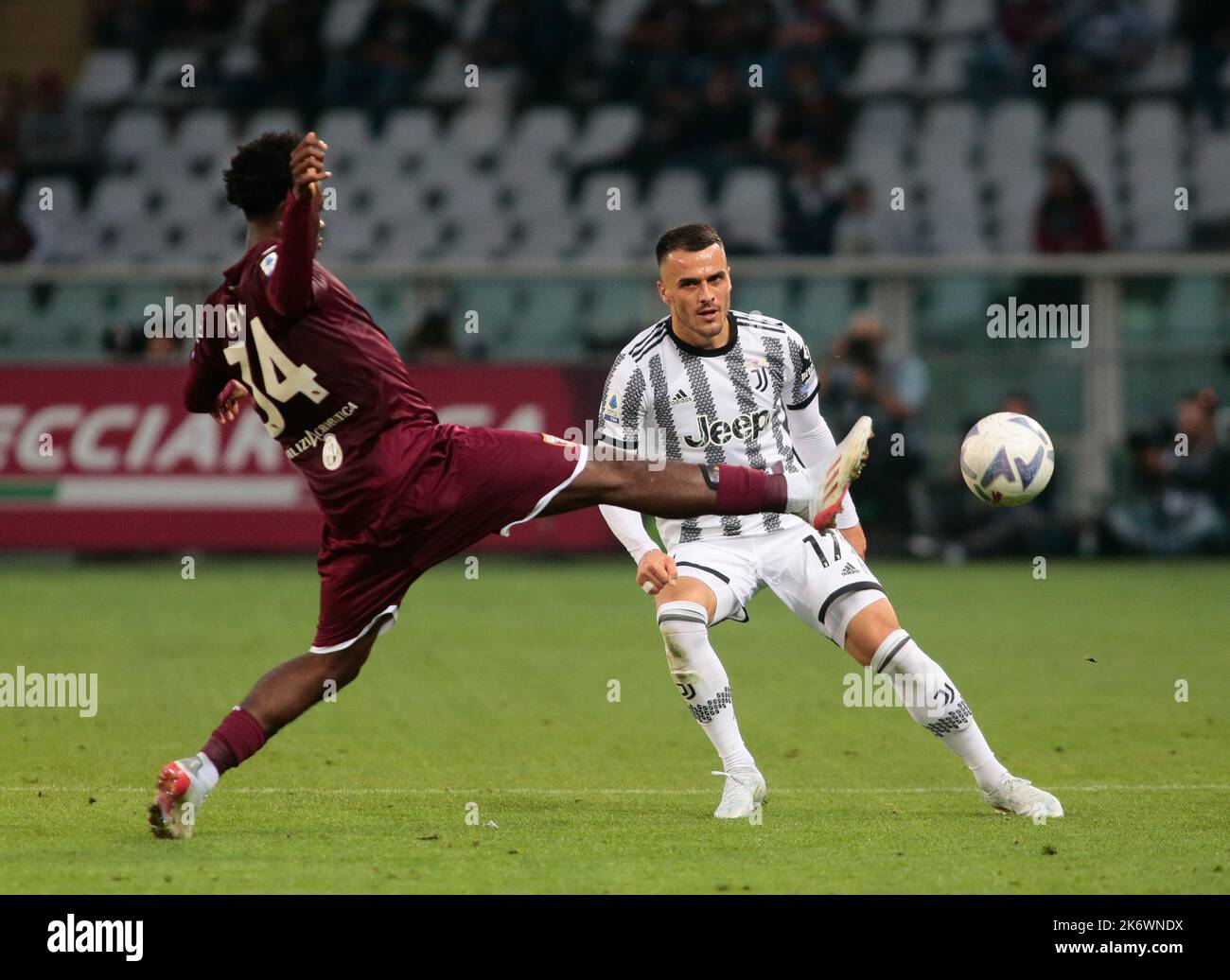 Ola Aina of Torino Fc and Filip Kostic of Juventus Fc during the ...