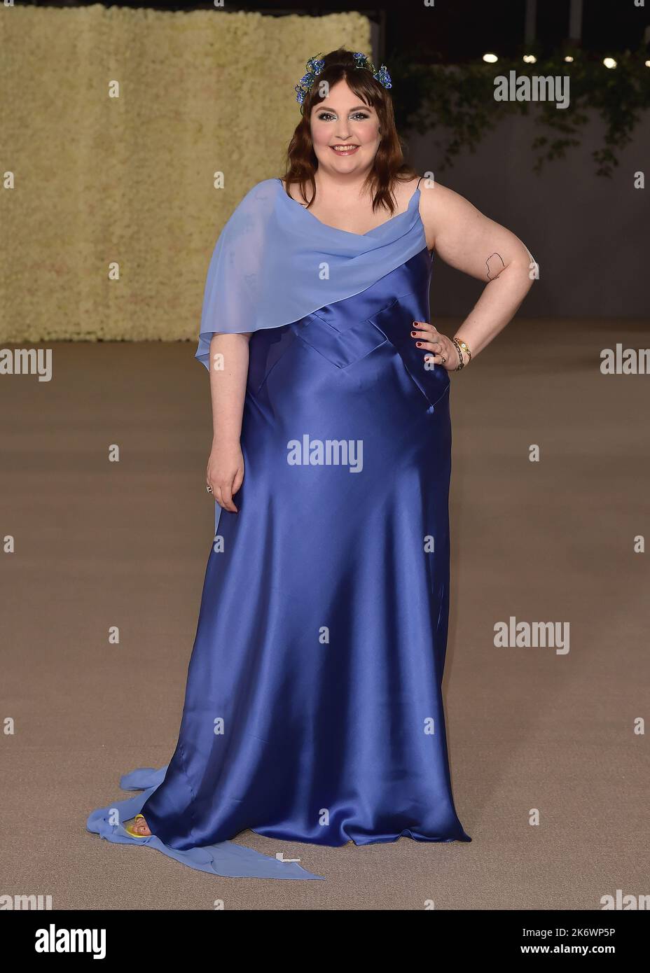 Lena Dunham walking the red carpet at the Second Annual Academy Museum ...