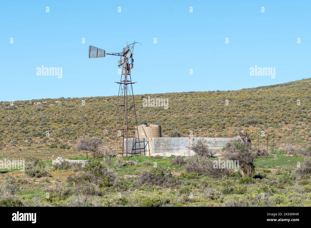 A broken windmill, a dam and a tank above the Ouberg Pass near ...