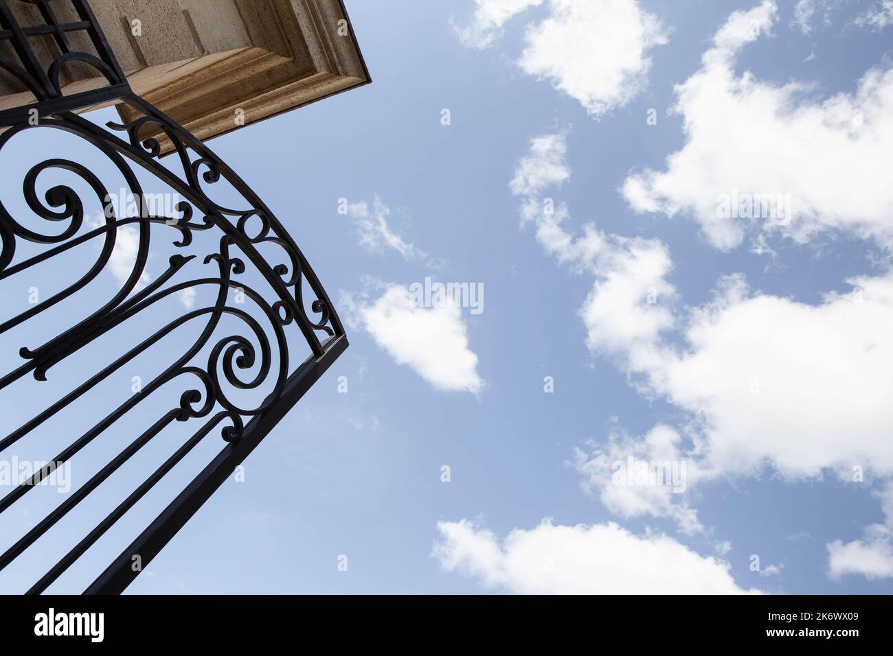 Wrought iron gate and stone pillar at the entrance of a castle Stock ...