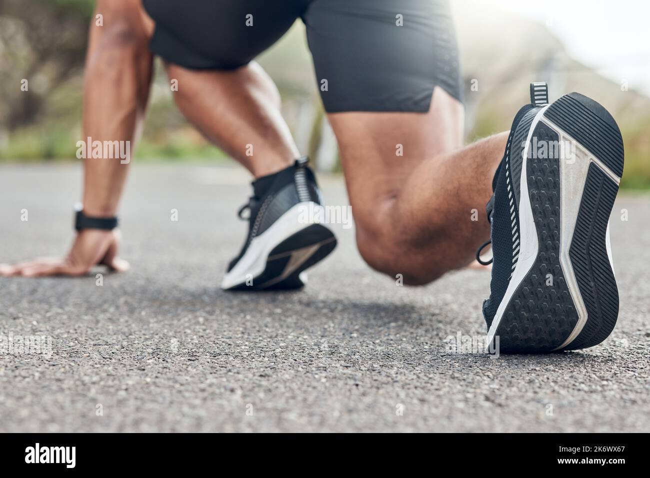 I have my eyes on the finish line. a sporty young man in starting ...