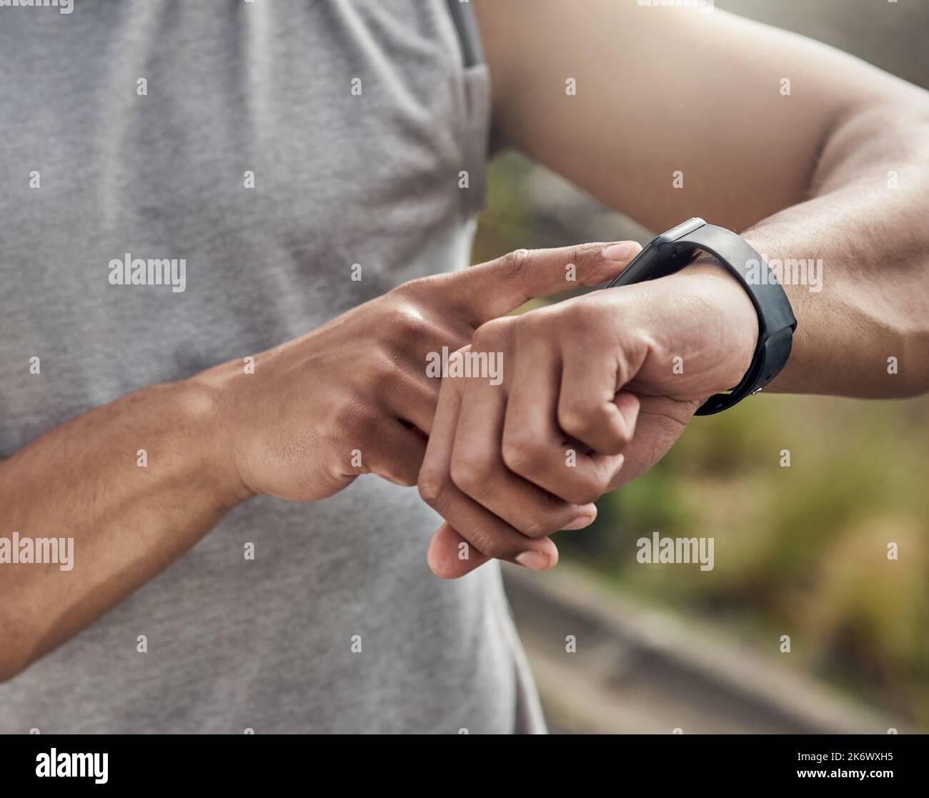 It takes time to achieve anything. a man checking his watch while out ...