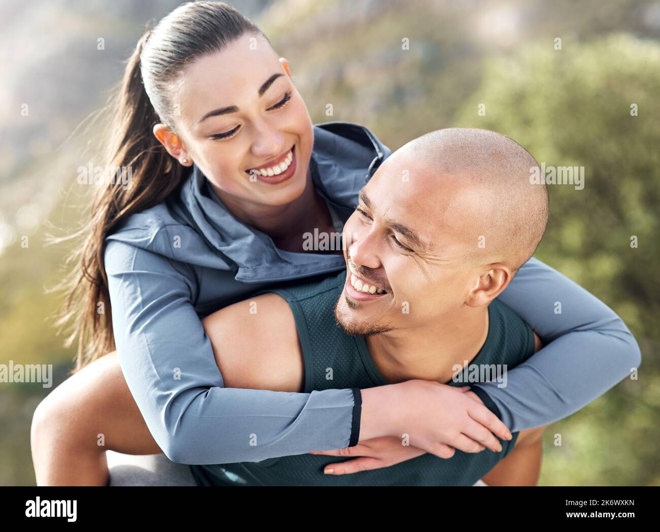 We make it our work to be active every day. a man carrying his ...
