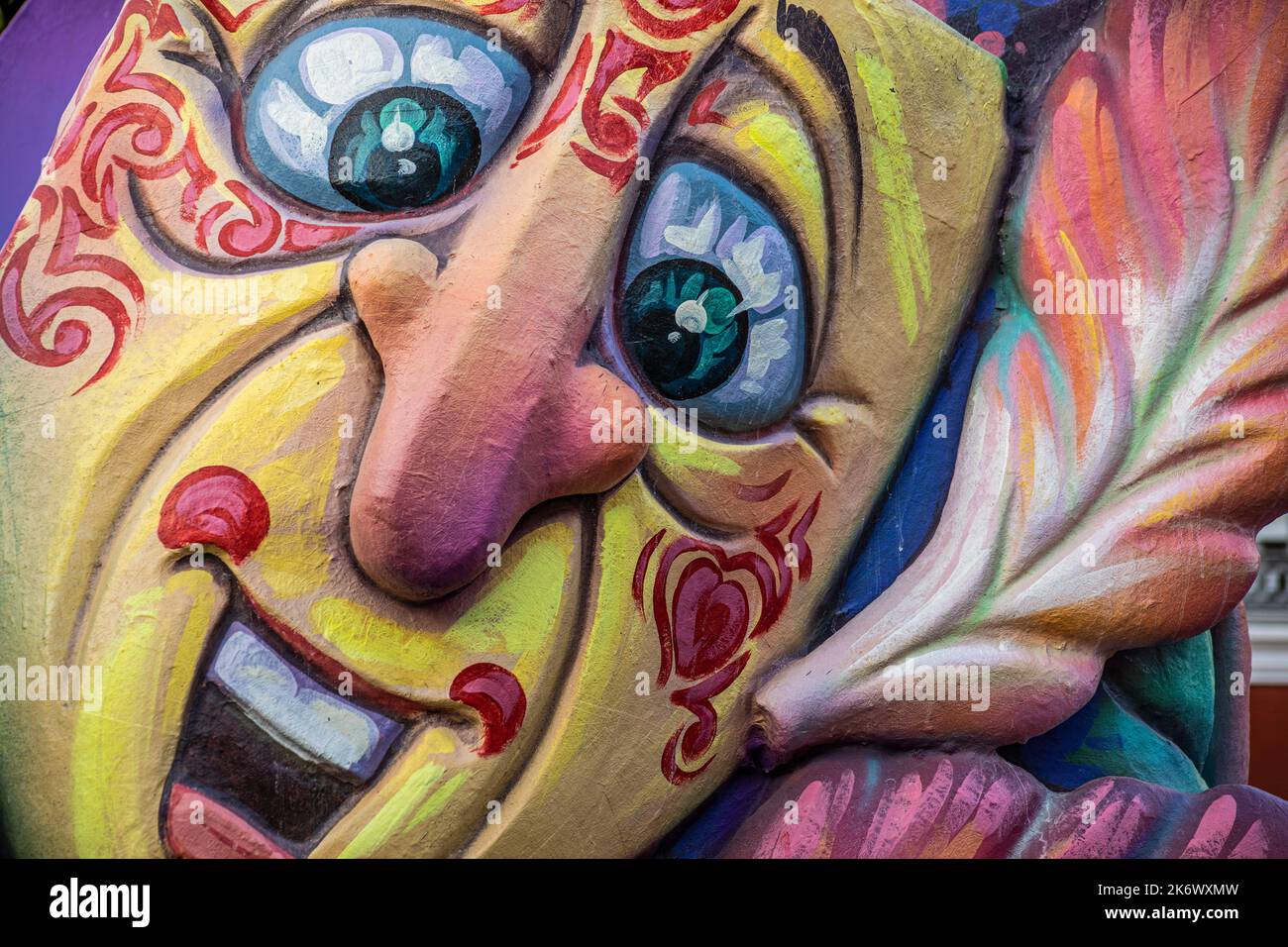 Cheerful and colorful masks decorating a float in a carnival parade ...