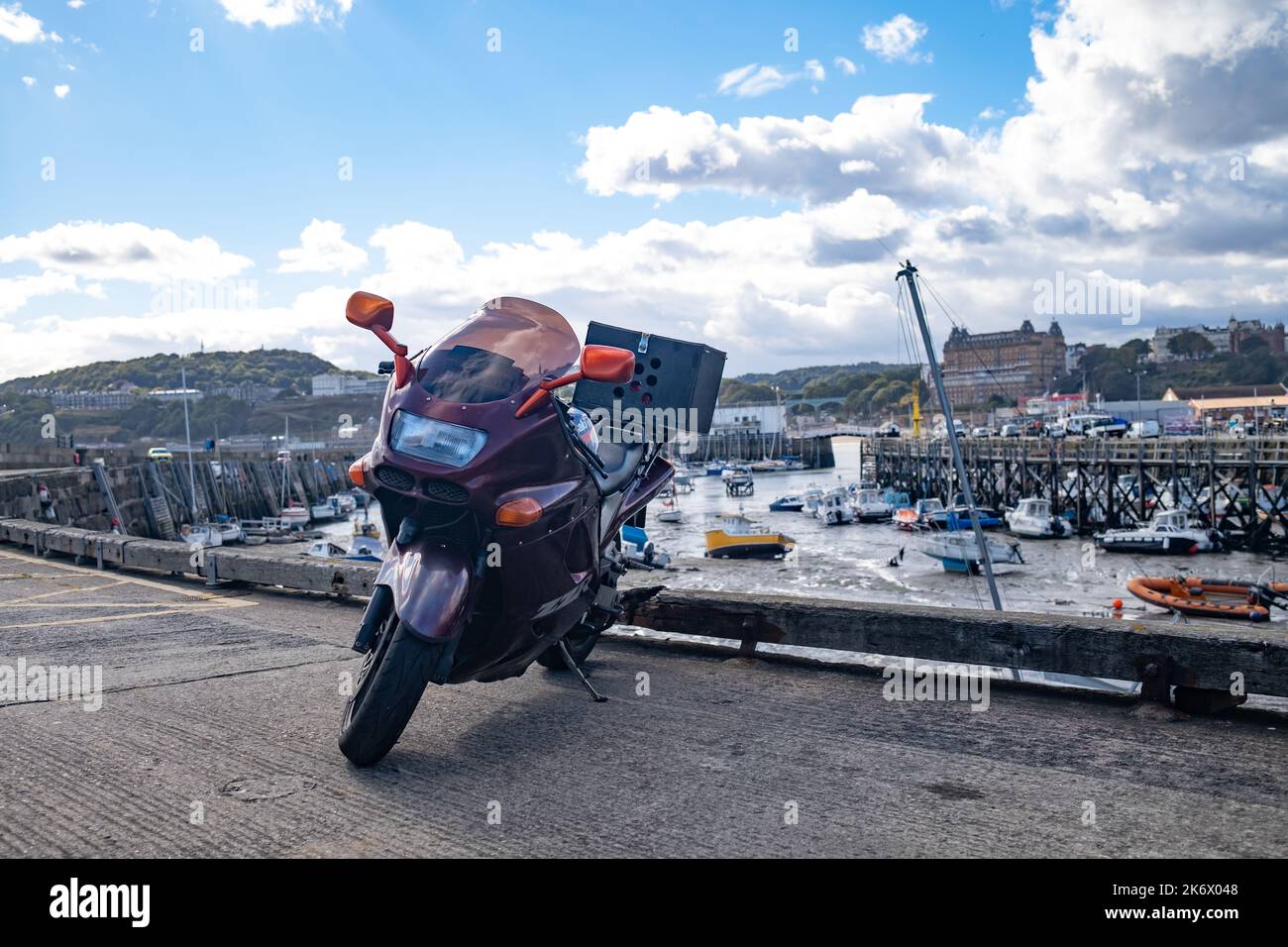 Vintage Kawasaki ZZR 1100 motorcycle parked up on the quay heading in ...