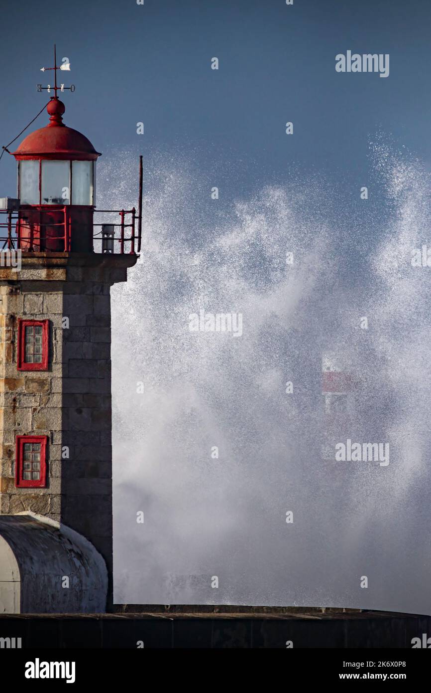 Big stormy sea wave splash. Douro river mouth old lighthouse Stock ...
