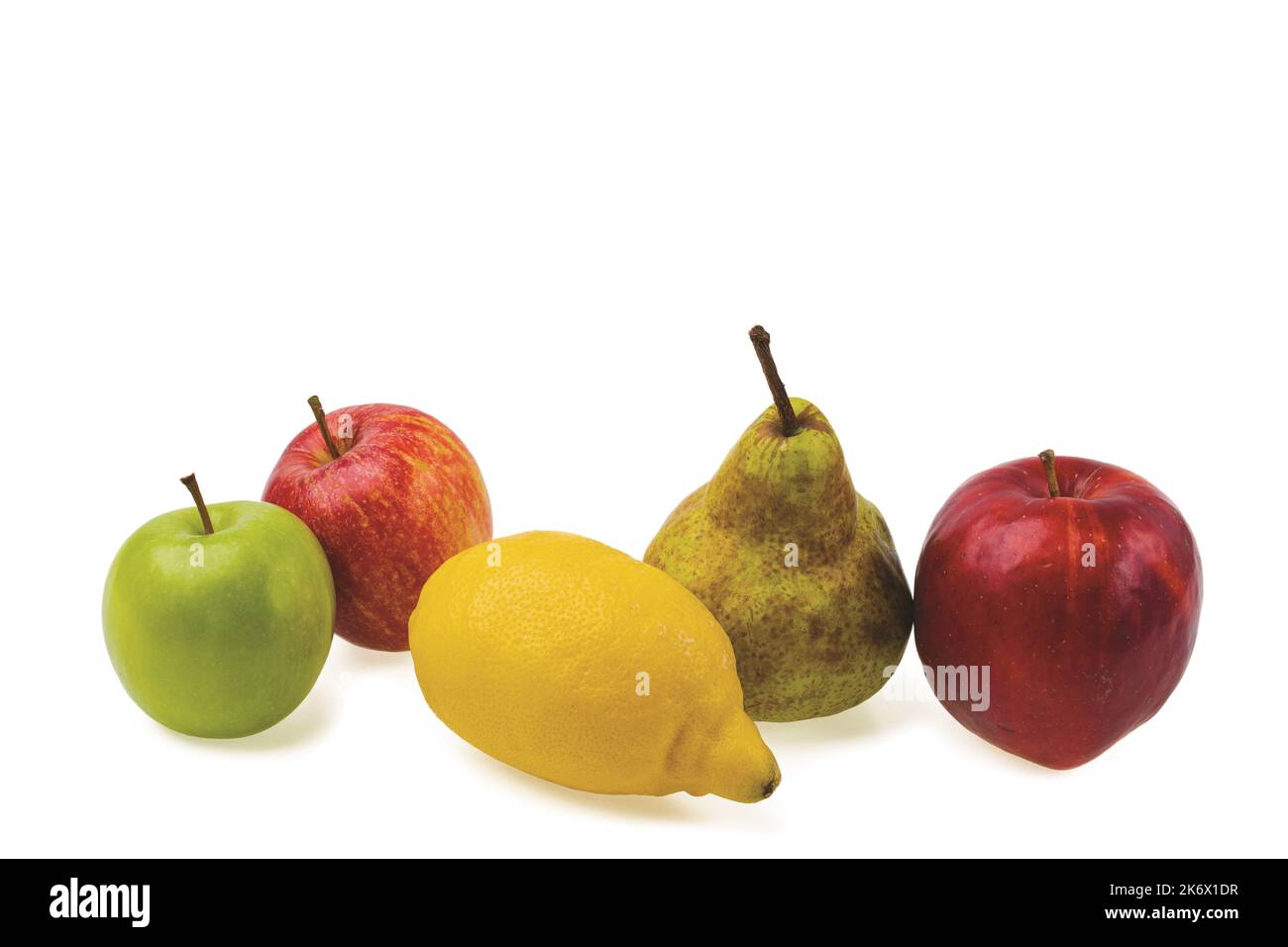 Close up view of diet fresh fruits of apples, lemon, and pear isolated ...