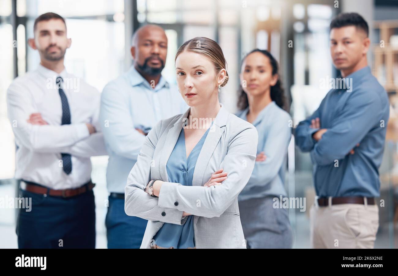 Were ready for anything. a group of businesspeople standing with their ...