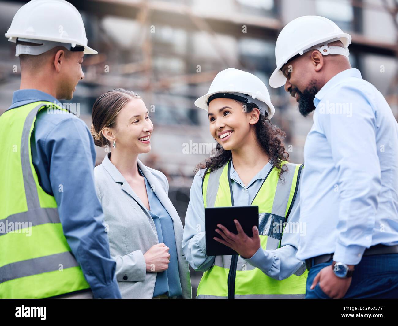 Good teamwork gets the job done quicker. a group of architects using a ...