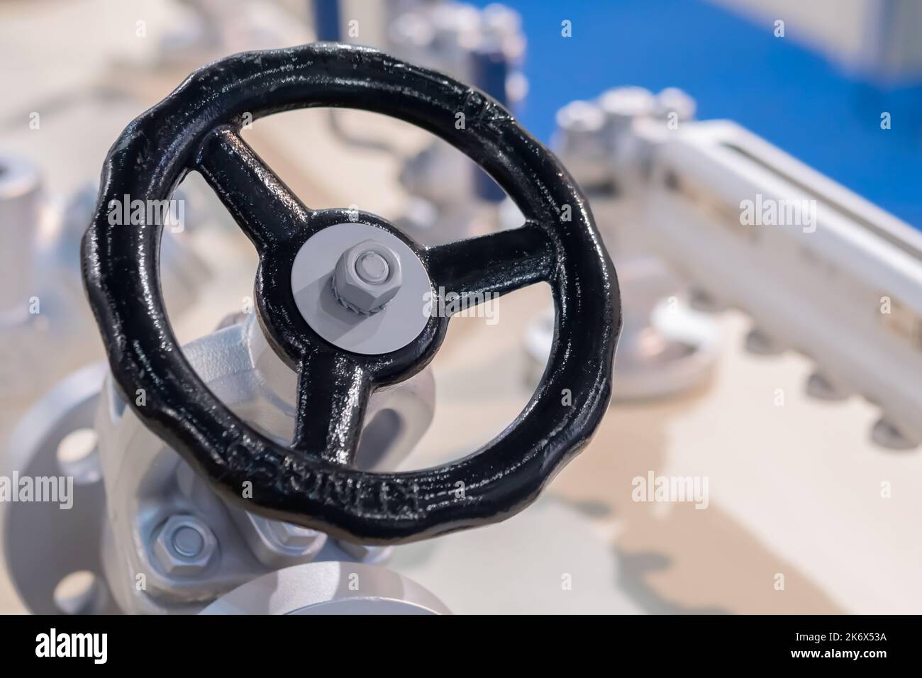 Black manual operate metal valve - industrial equipment at plant Stock ...