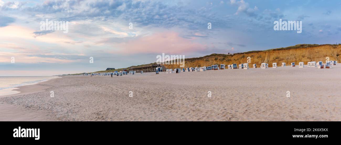 Sunset and beach chairs - Kampen Beach on the island Sylt Stock Photo ...