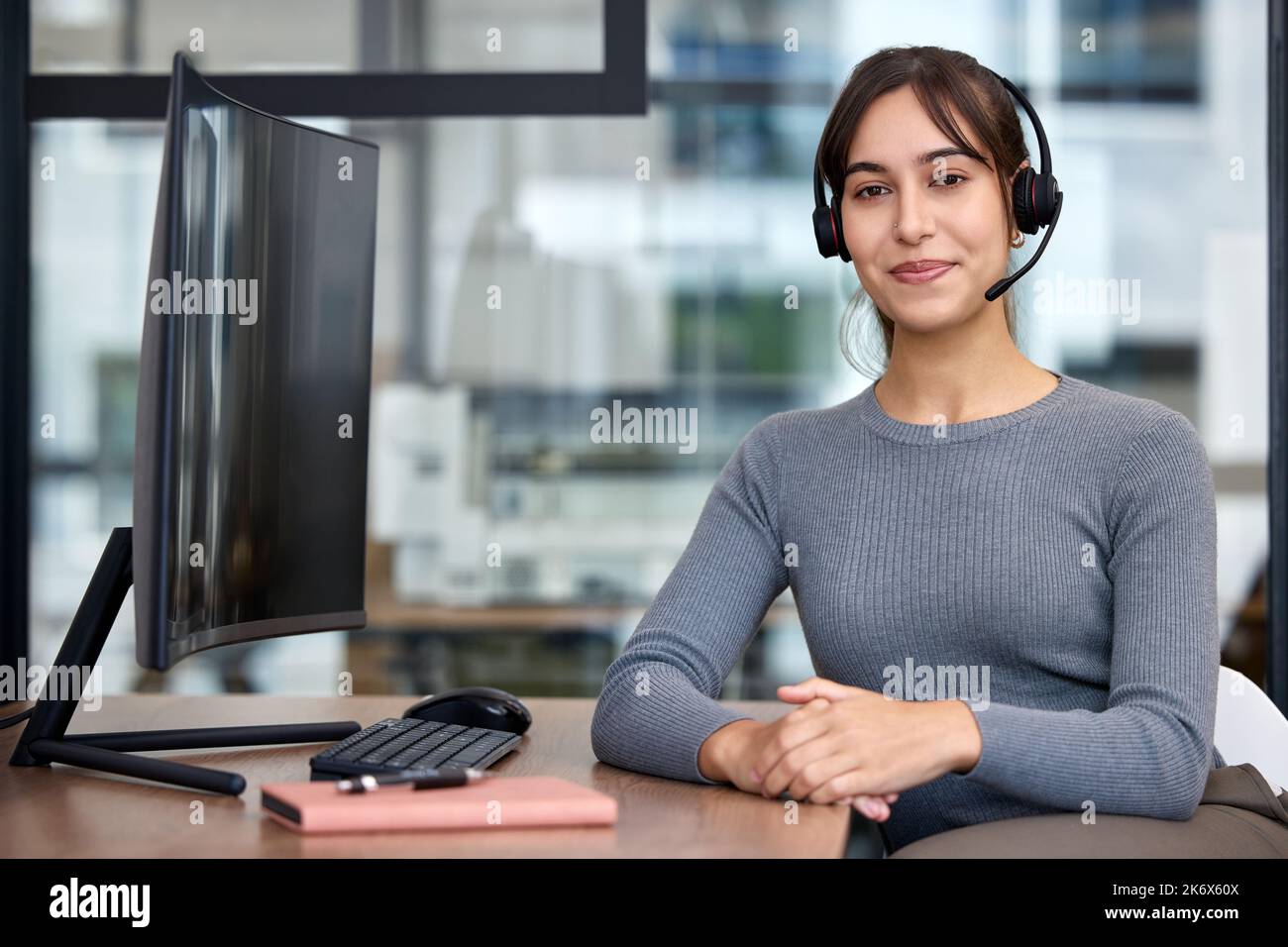 To succeed, work hard, never give up. a young businesswoman working on ...