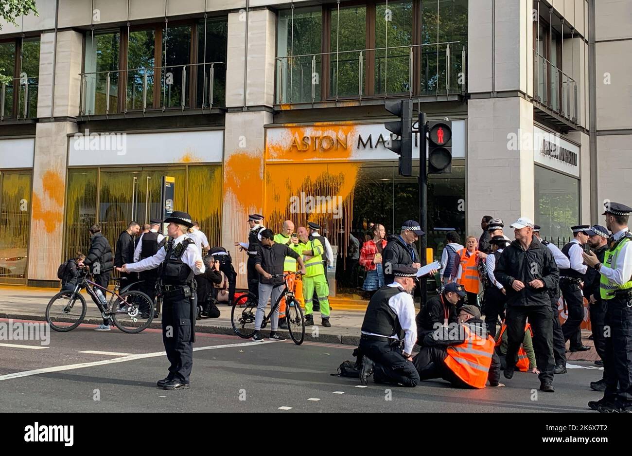 Police with Just Stop Oil protesters who have blocked Park Lane in ...