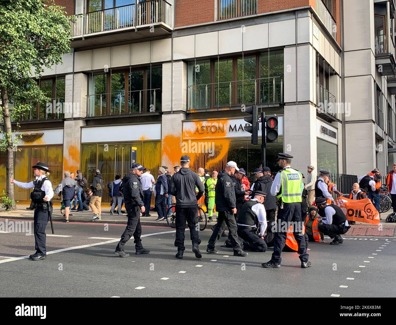 Police with Just Stop Oil protesters who have blocked Park Lane in ...
