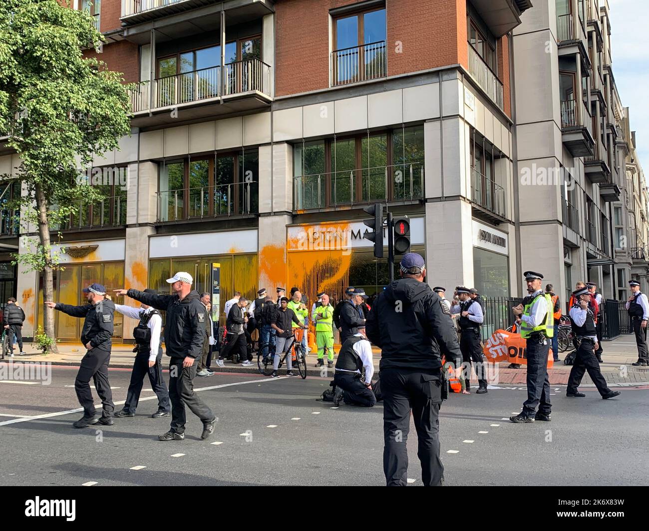 Police with Just Stop Oil protesters who have blocked Park Lane in ...