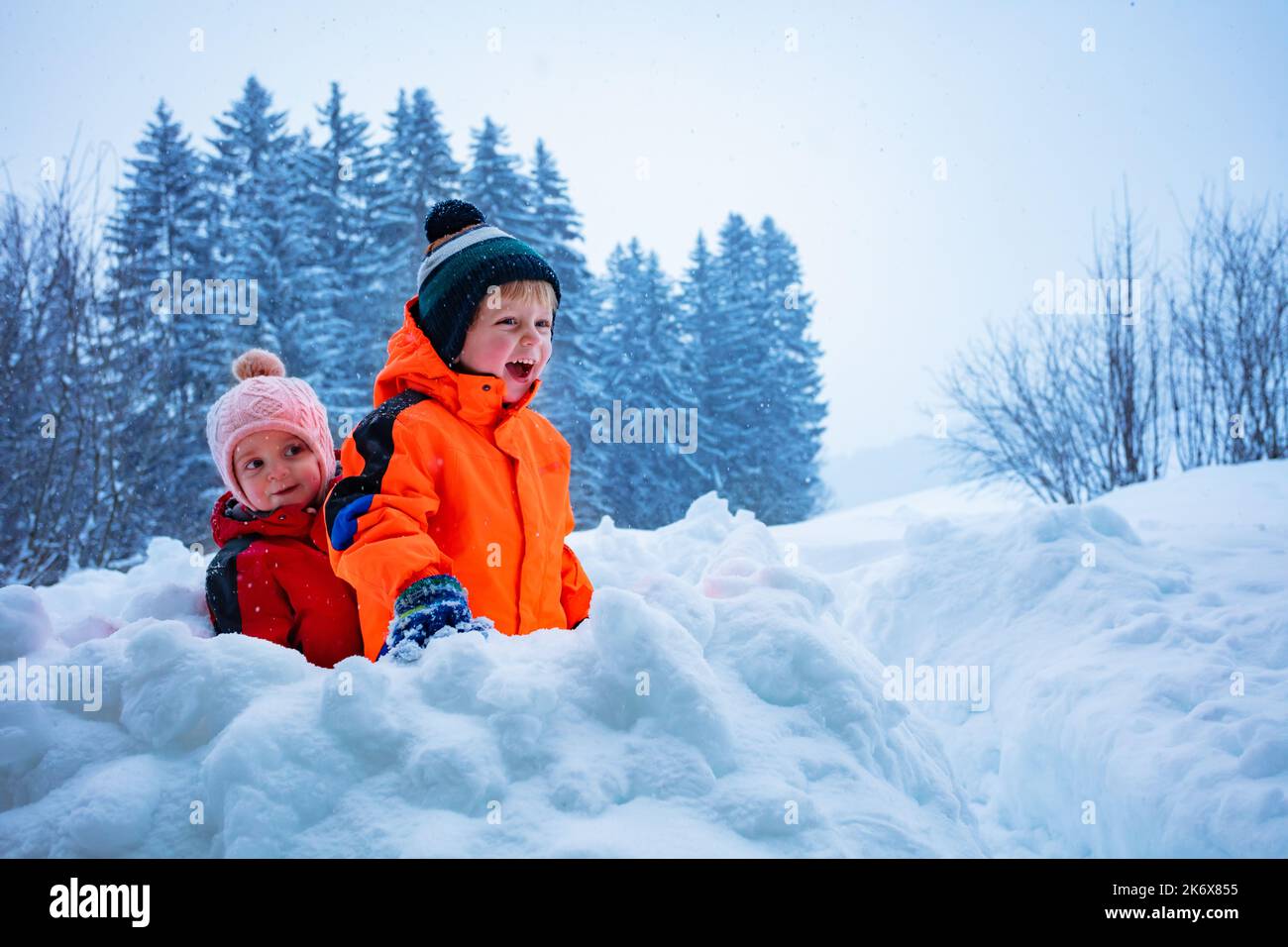 Kids Building A Snow Fort