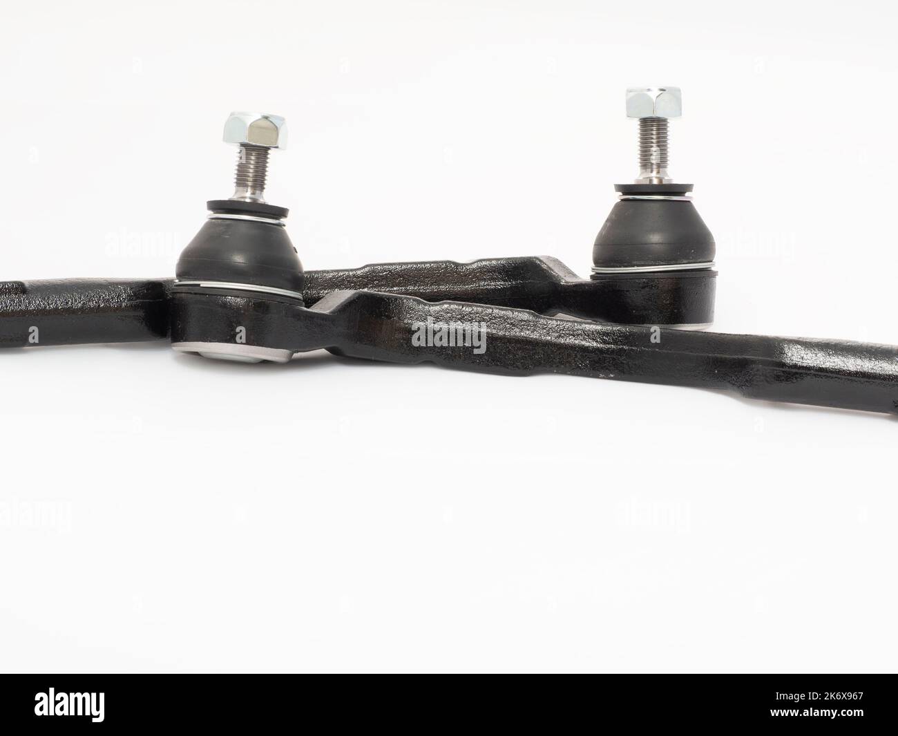 Car track rod end steering joint isolated against a white background ...