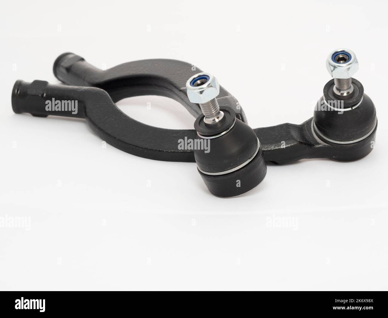 Car track rod end steering joint isolated against a white background ...