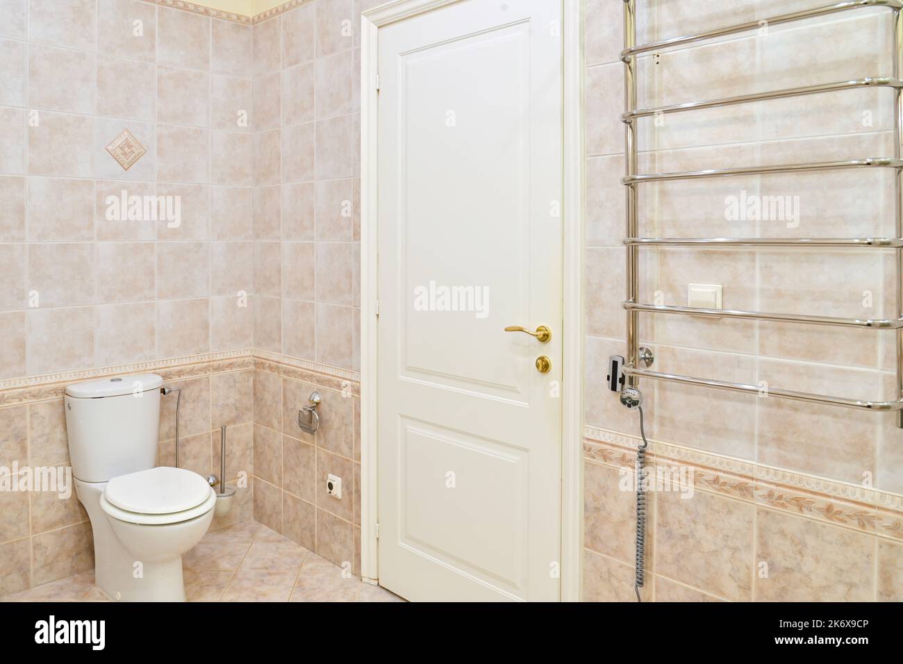 A clean toilet room in a hotel room with toilet and a bidet Stock Photo ...