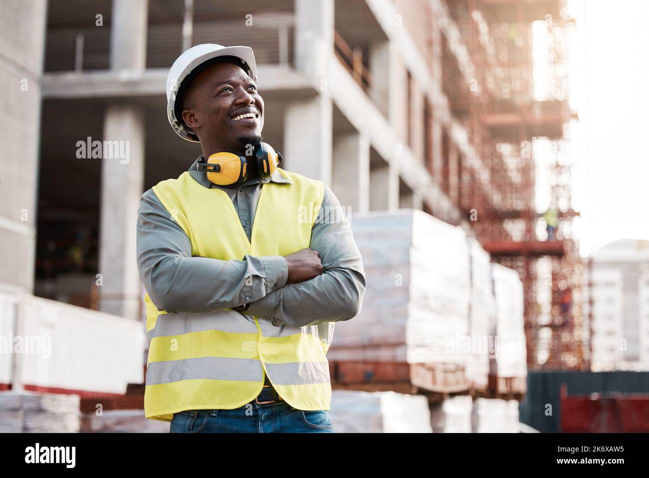Watching my ideas take shape. a young male construction worker day ...