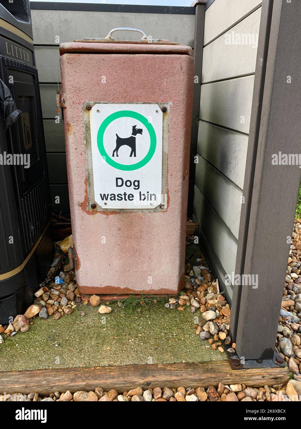 Close up of a dog waste bin seen outdoors in the UK Stock Photo - Alamy