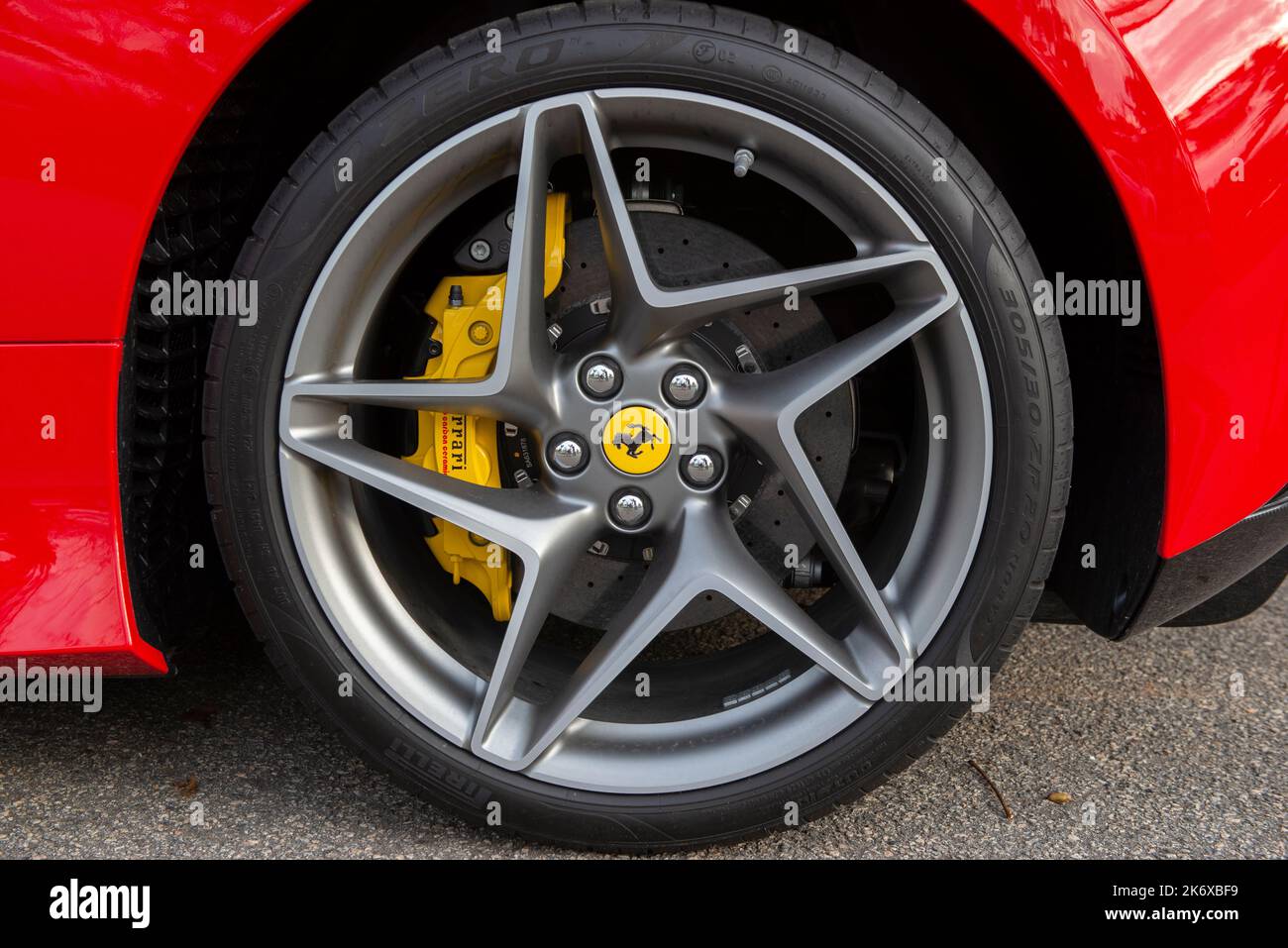 Atibaia - Brazil, October 7, 2022: Side view of a wheel of a red ...