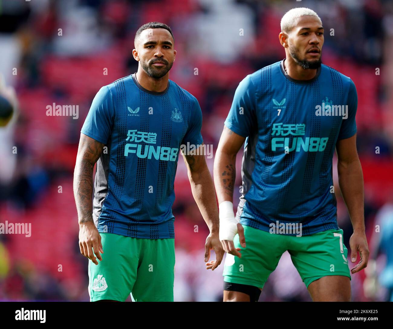Newcastle United's Callum Wilson (left) warms up ahead of the Premier ...