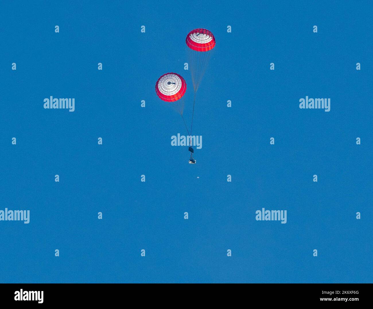 The drogue parachutes of the SpaceX Crew Dragon Freedom spacecraft are ...