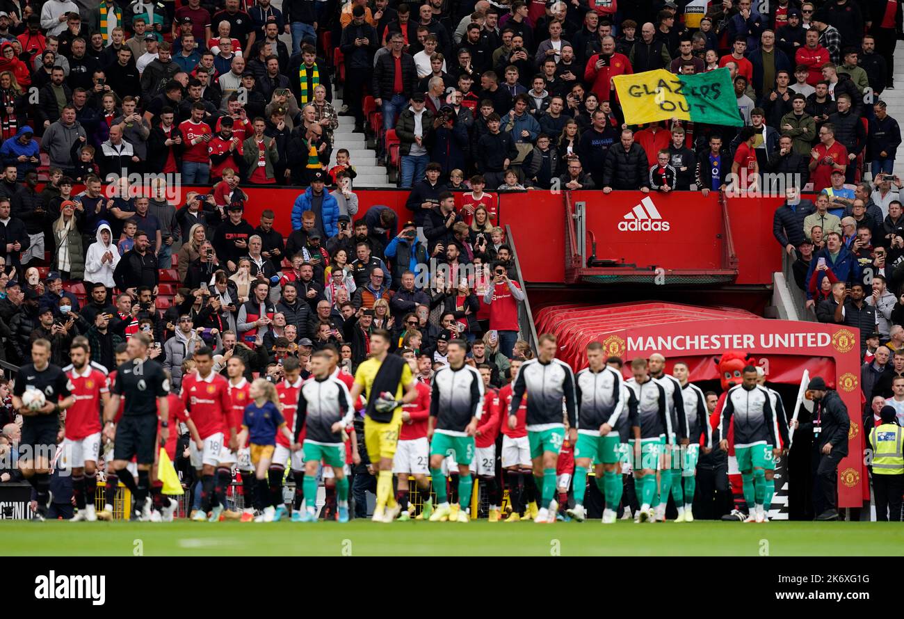 Manchester, UK. 16th Oct, 2022. A Glazers out flag appears as the teams ...