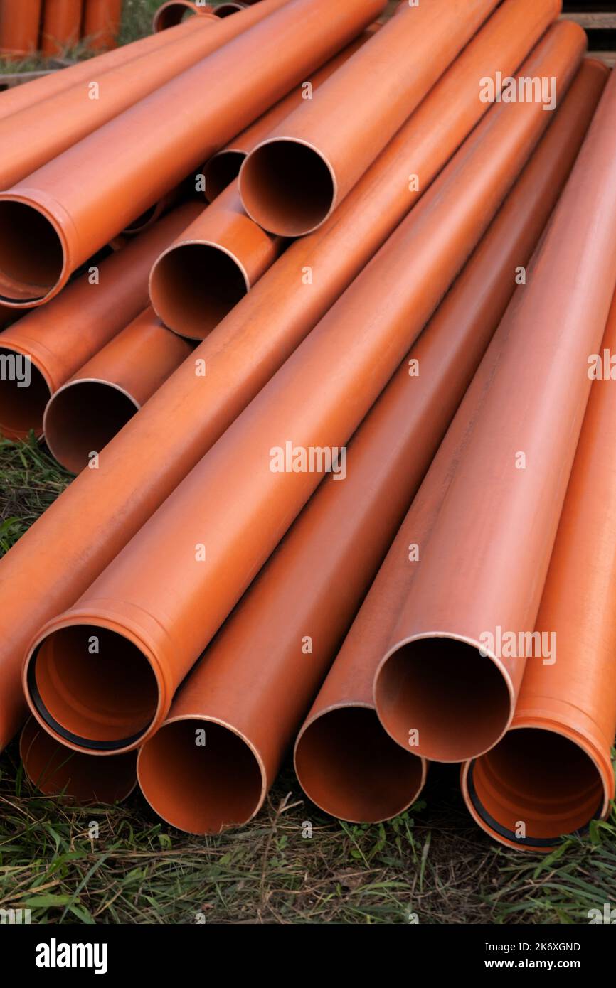 Heap of Prepared Drainage System from Plastic pipes on the ground ...