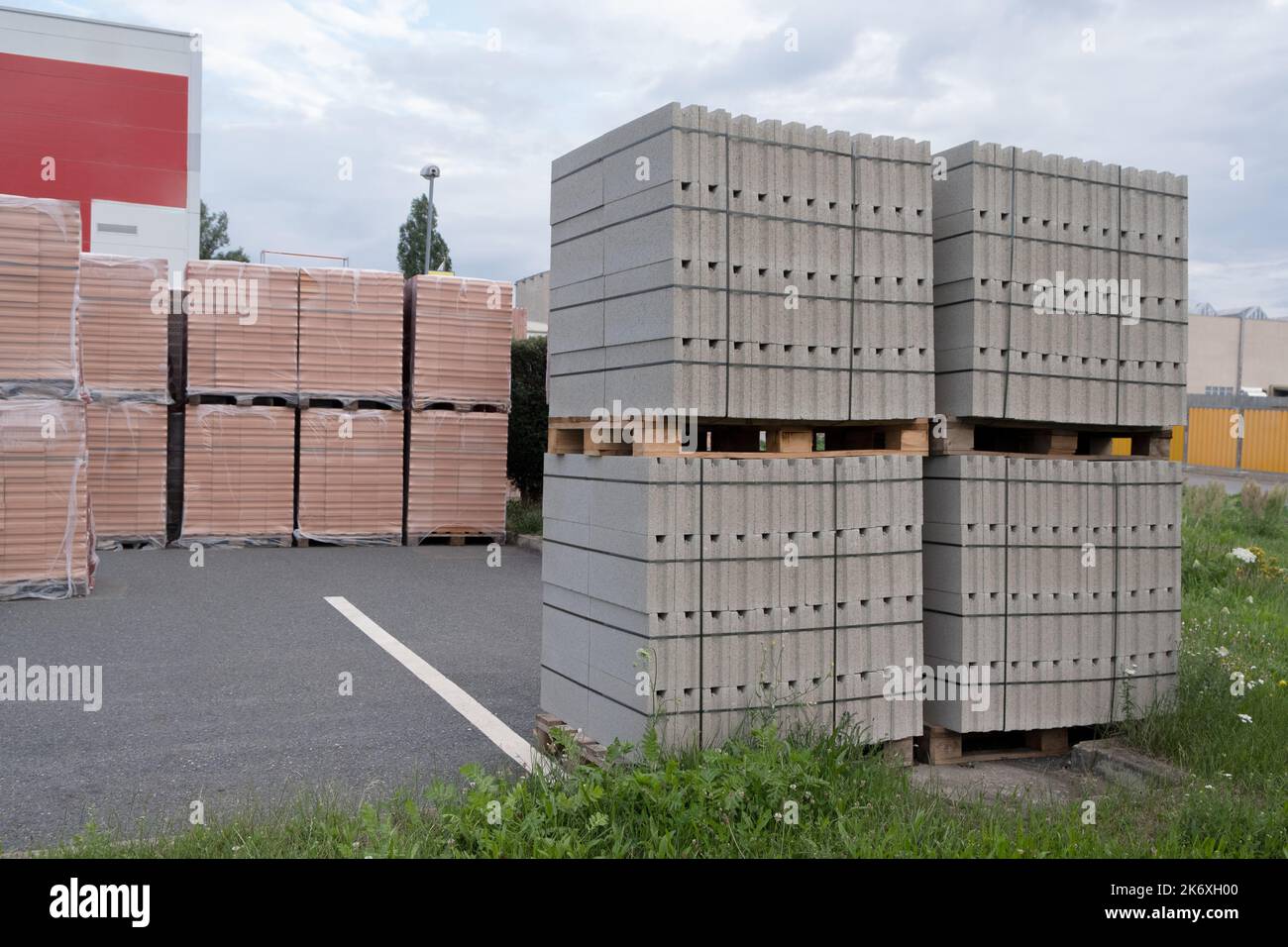 Pallet of Concrete Cinder Blocks, Grey Uniformed brick Shapes building material. New for use on ...