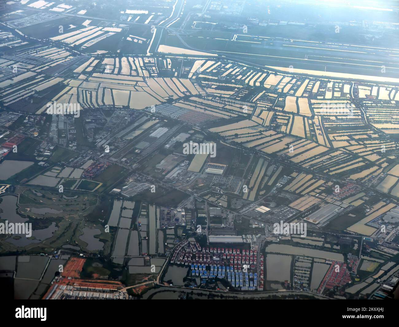 Aerial view of landscape, green paddy fields, farm, agriculture, water ...