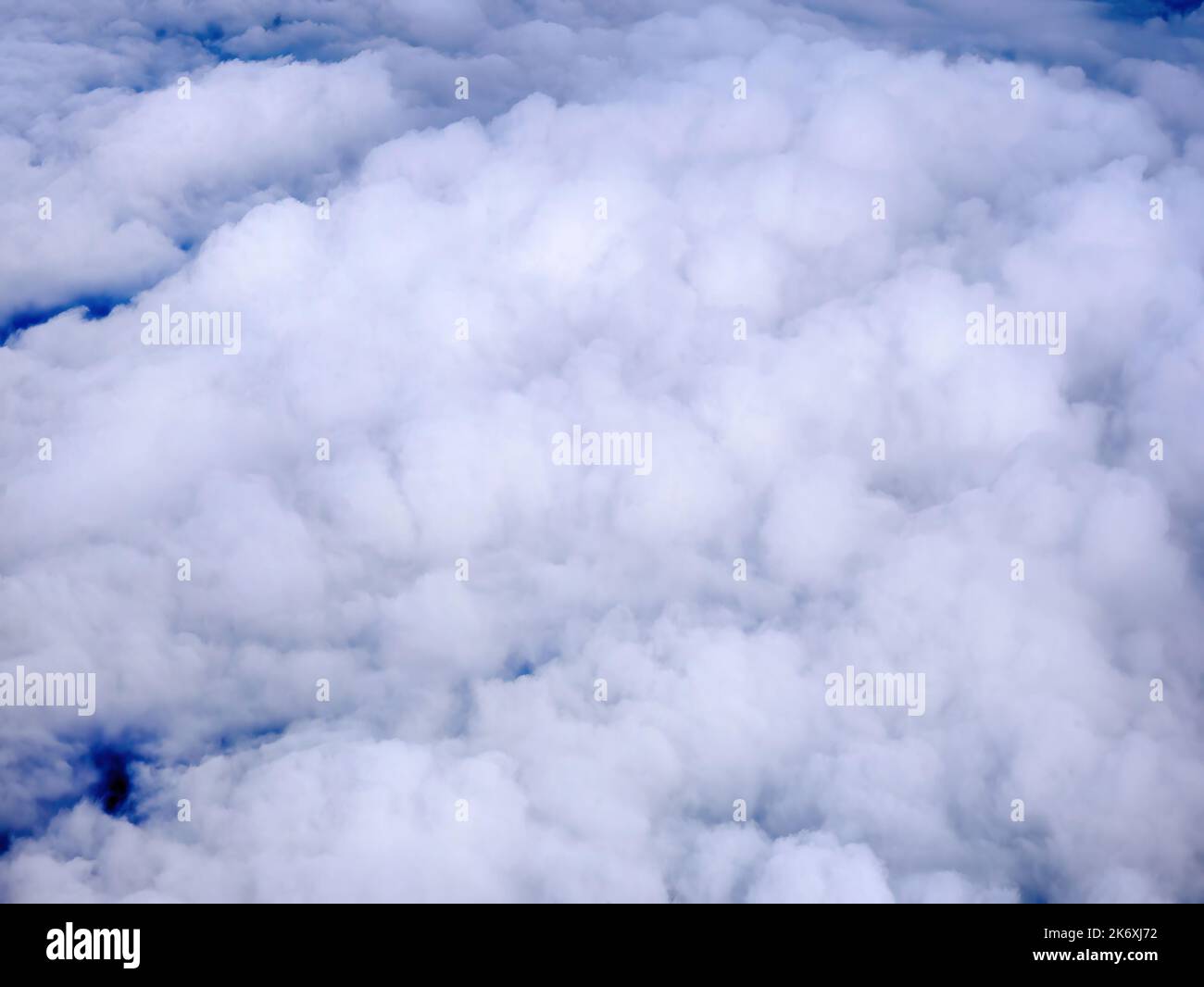 Aerial view of tranquil cloudscape in the blue sky with landscape ...