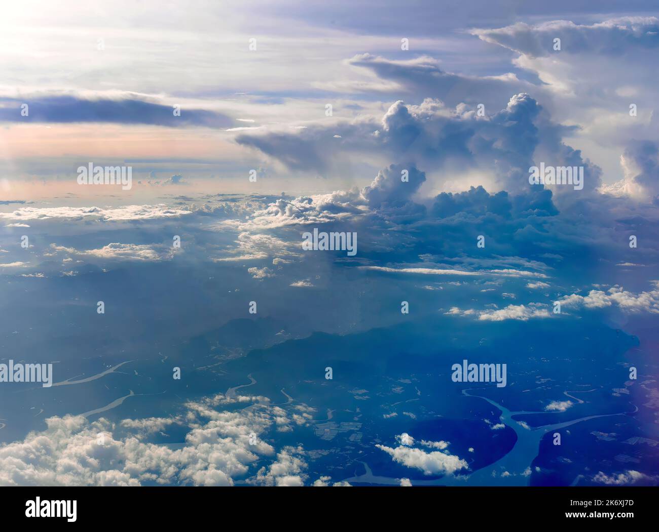 Aerial view of tranquil cloudscape in the blue sky with landscape ...