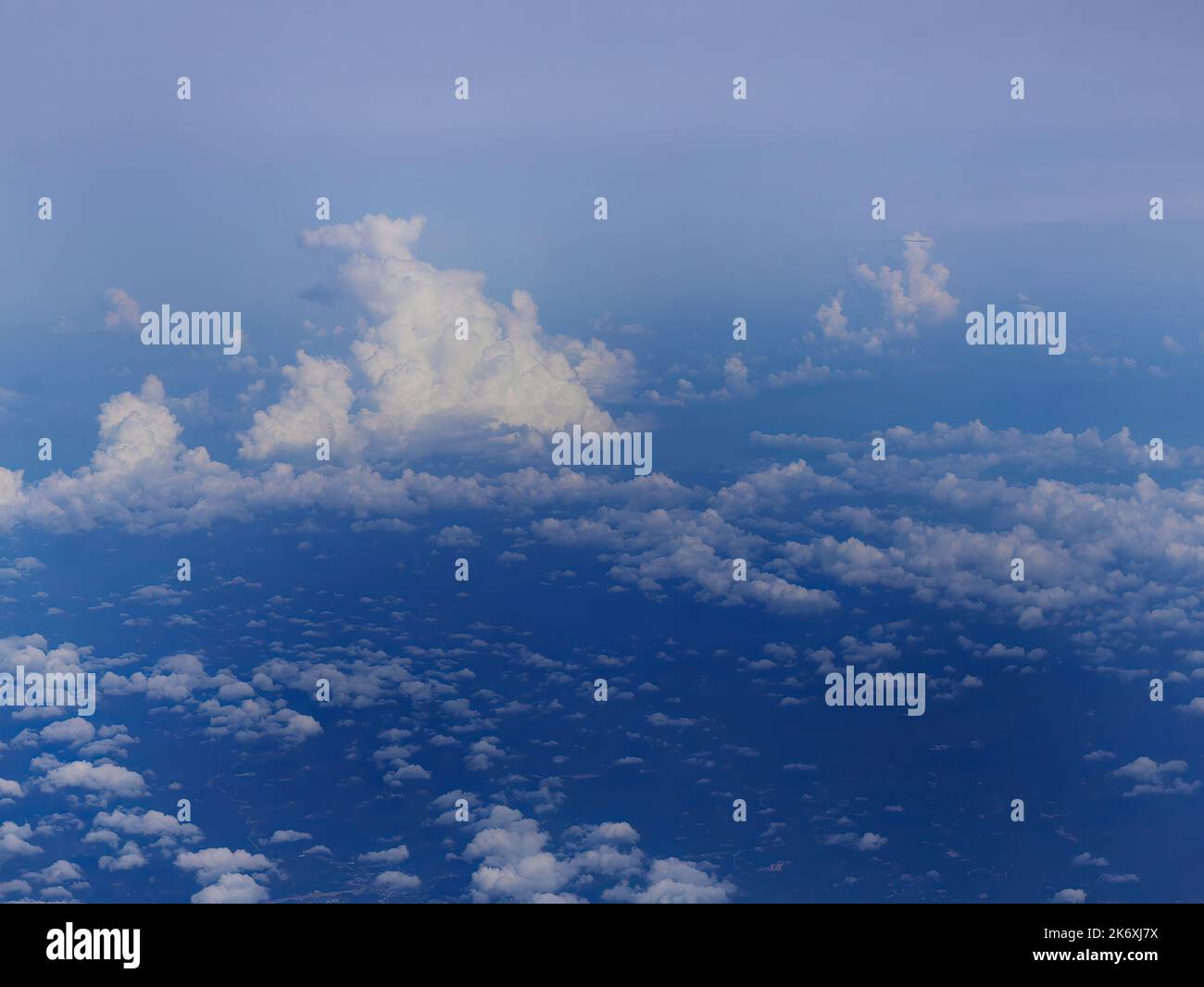 Aerial view of tranquil cloudscape in the blue sky with landscape ...