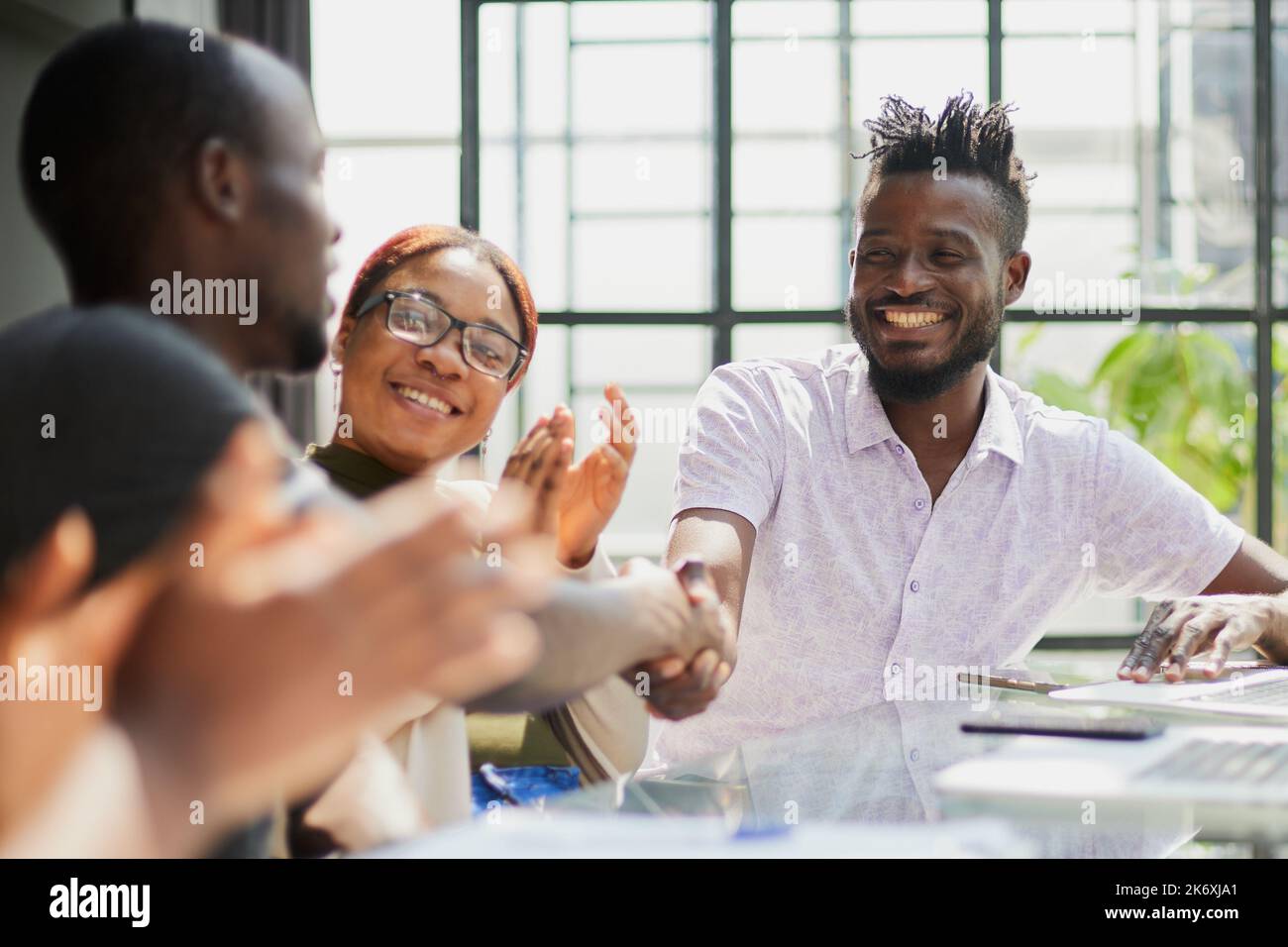 african business people handshake at modern office Stock Photo - Alamy