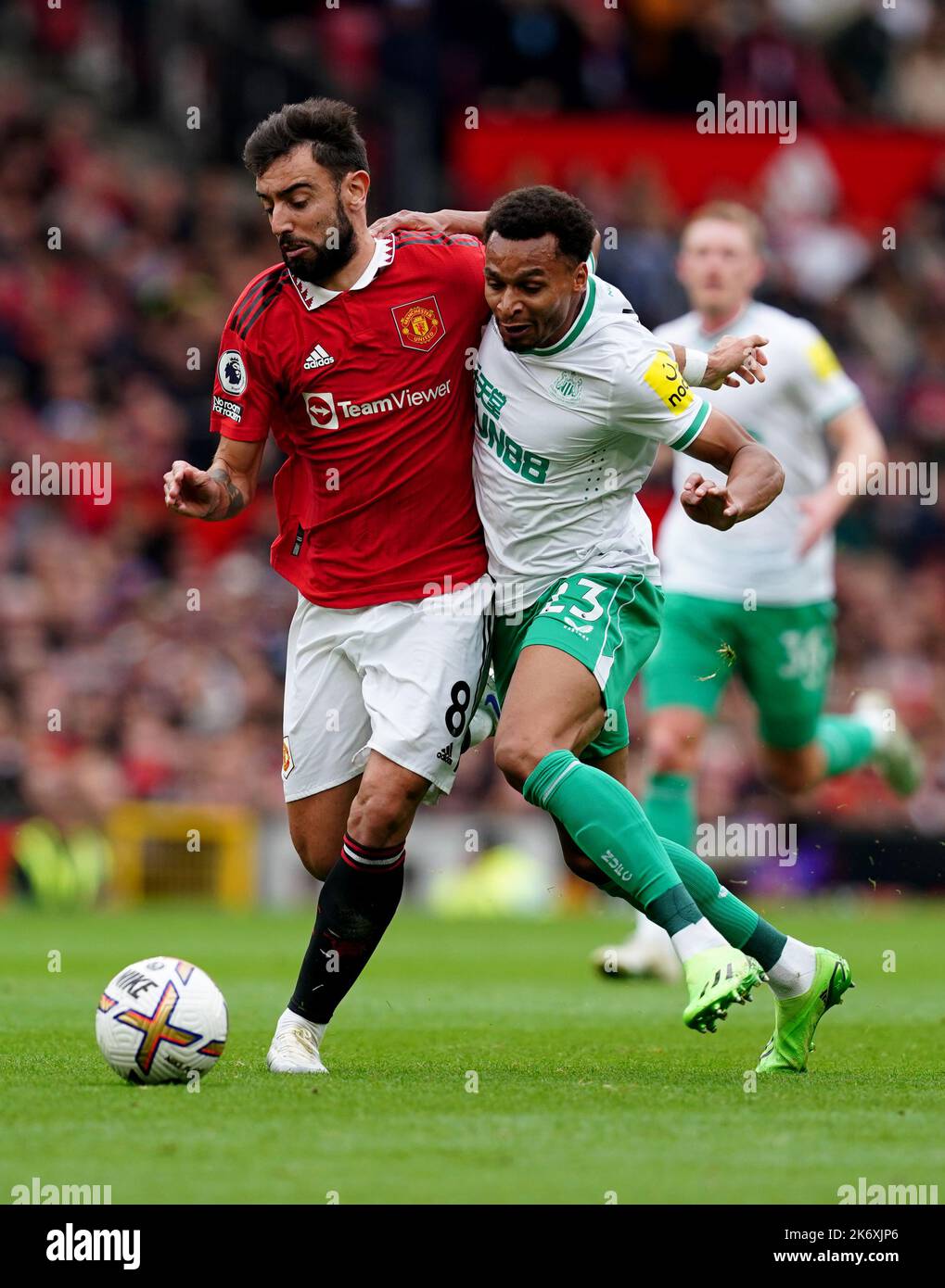 Manchester United's Bruno Fernandes battles with Newcastle United's ...