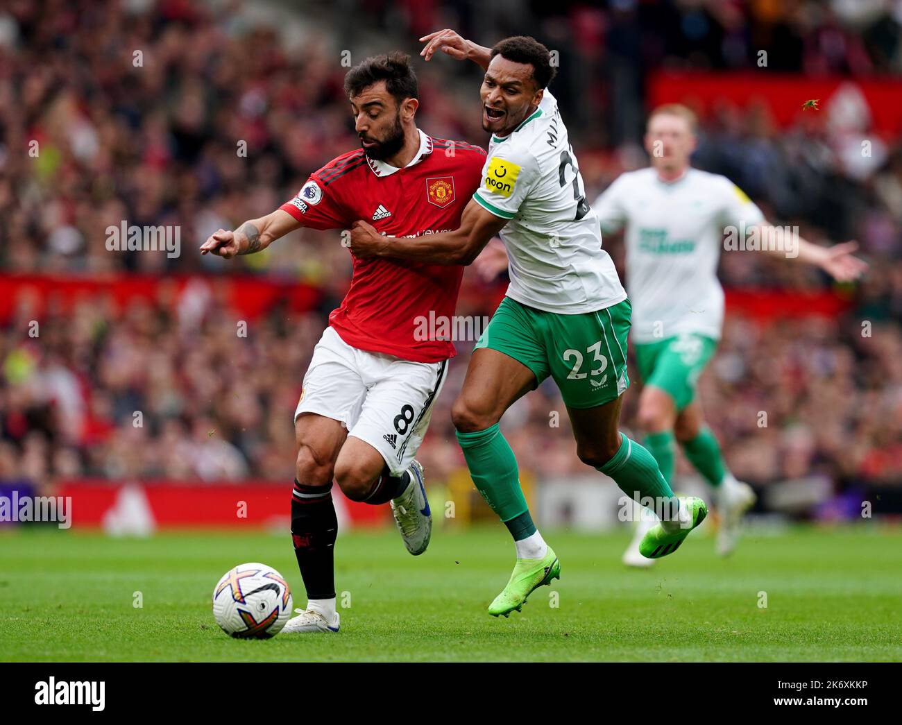 Manchester United's Bruno Fernandes battles with Newcastle United's ...