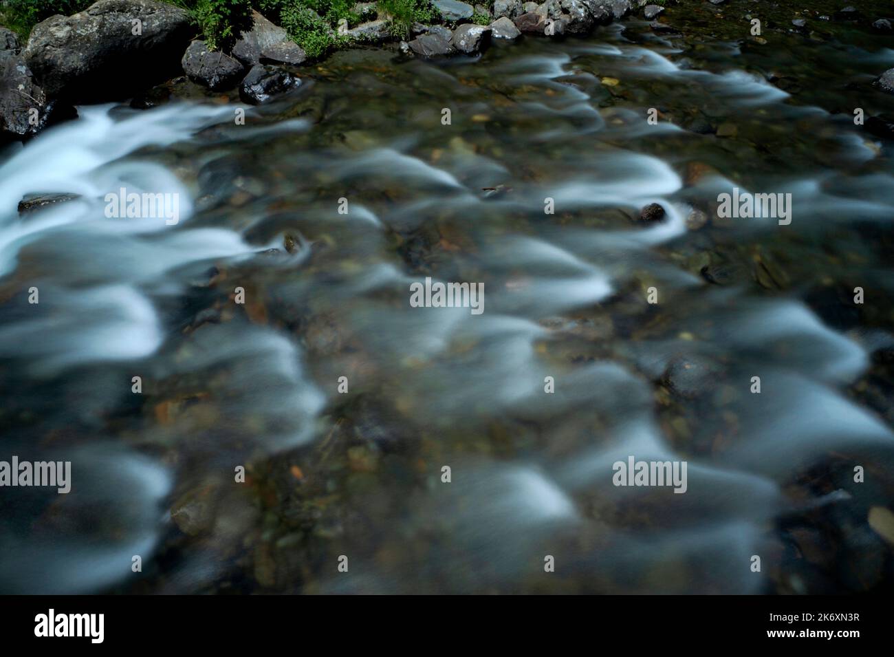 Time-exposure photography blurs the rippling surface of Andorra’s ...