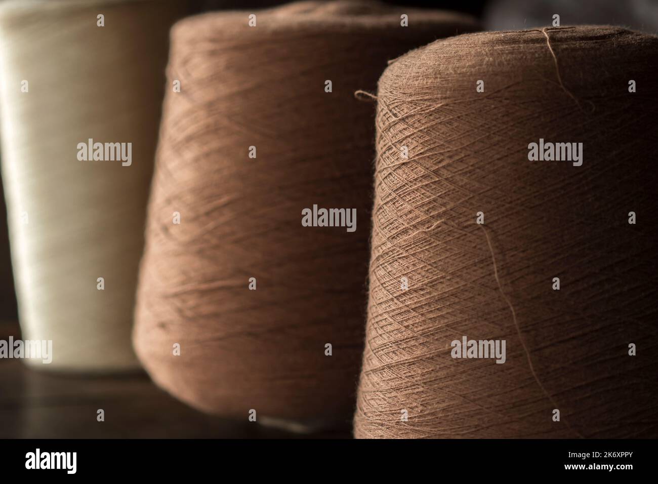 Natural cotton yarn. In rolls. Brown cotton fibers Stock Photo - Alamy