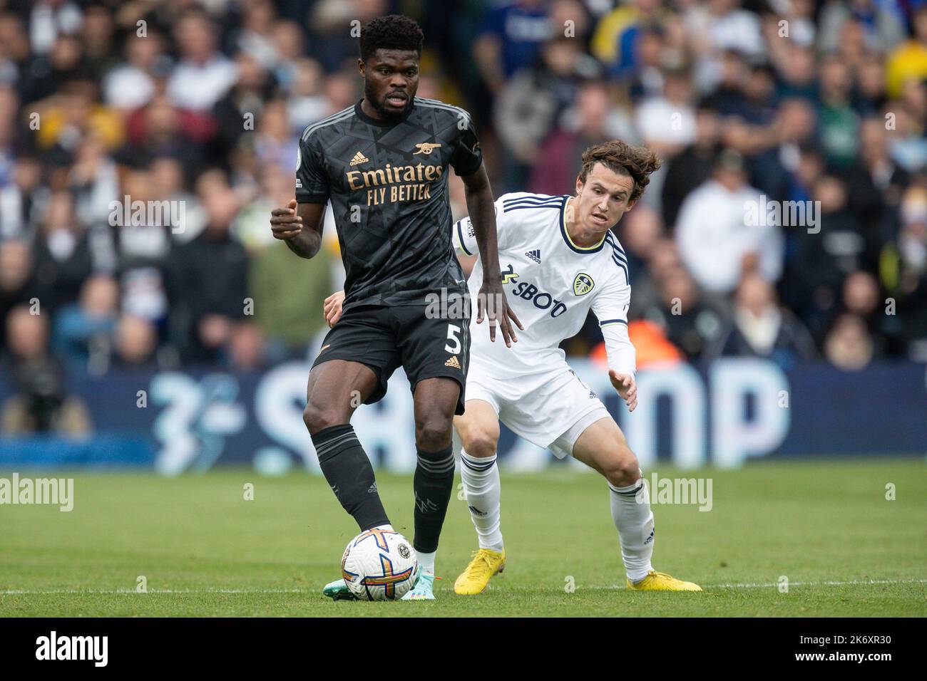 Brenden Aaronson #7 of Leeds United applies pressure to Thomas Partey ...