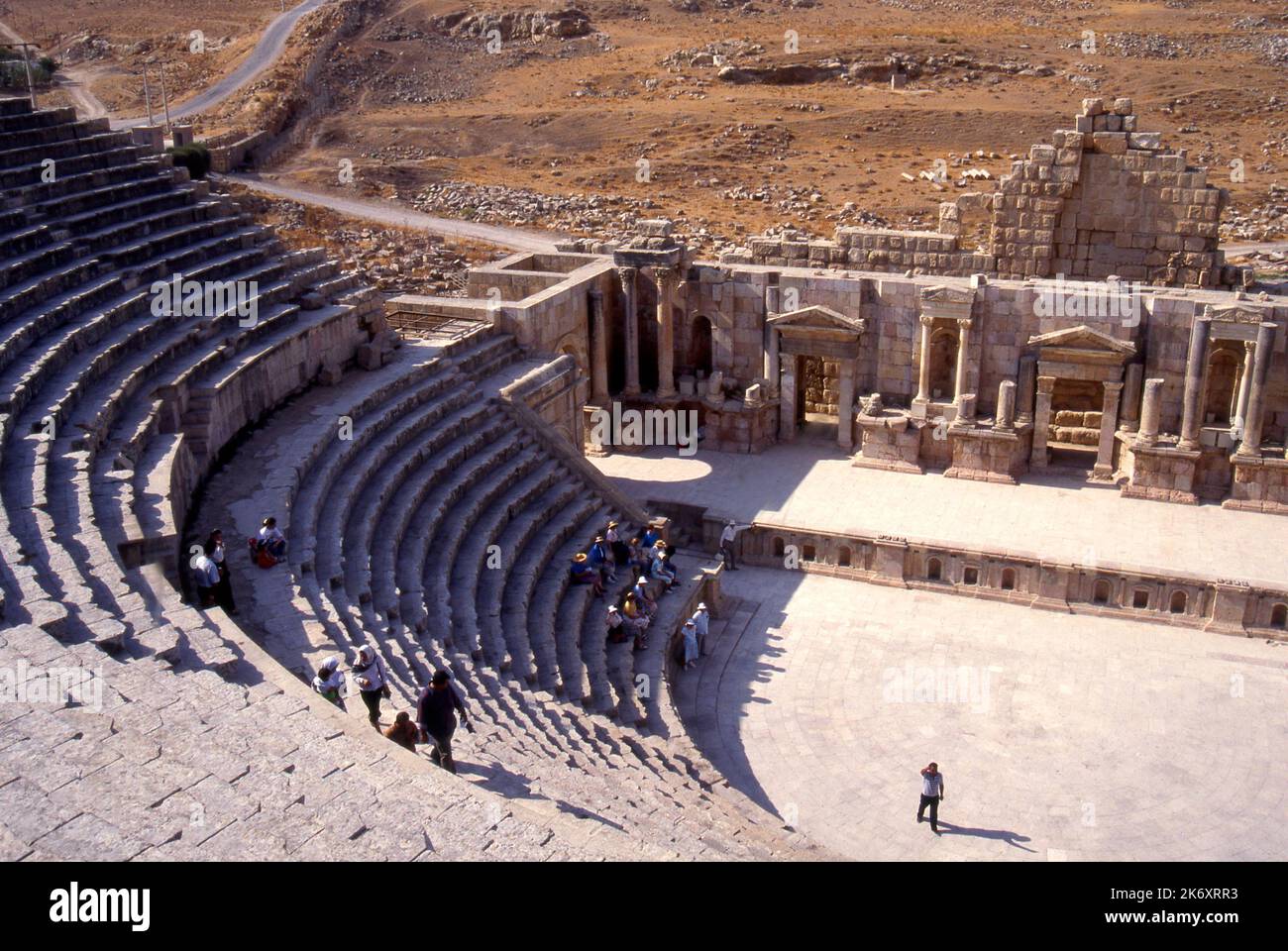 Part of the old Roman south theatre, Jerash, Jordan with tourists ...