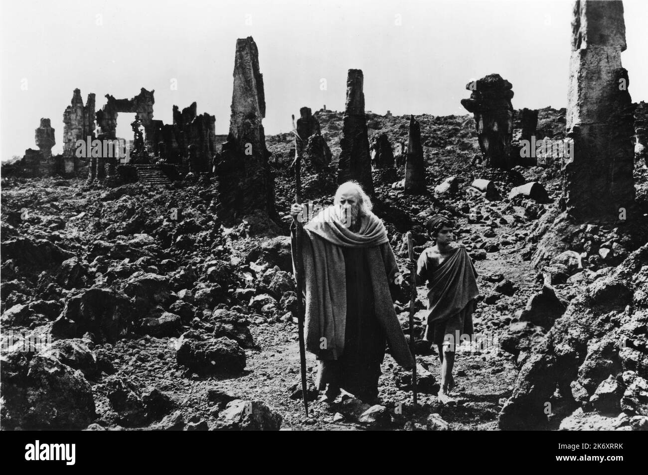 GEORGE C. SCOTT as Abraham and ALBERTO LUCANTONI as Isaac walk through ...