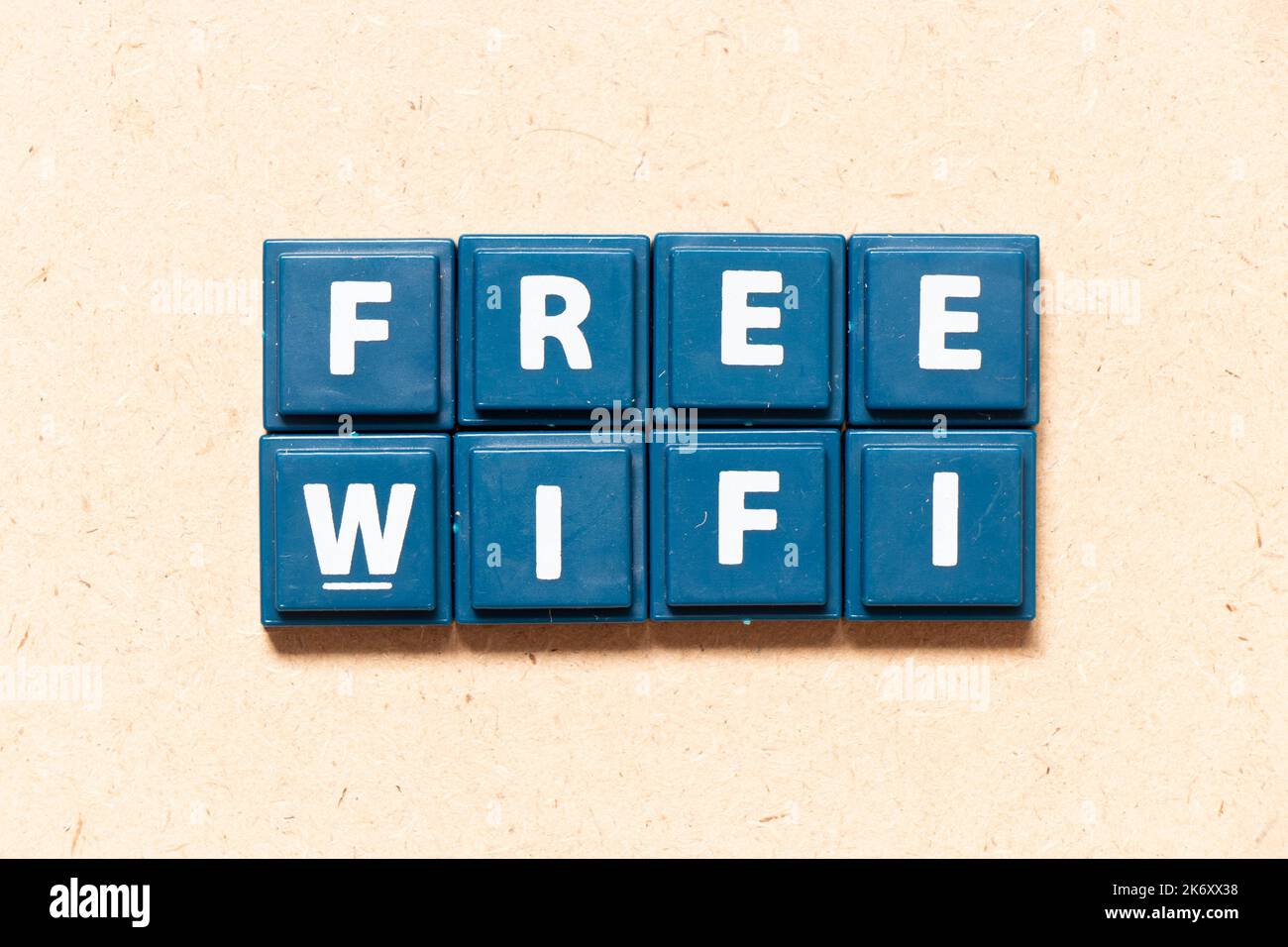 Tile letter in english word free wifi on wood background Stock Photo ...