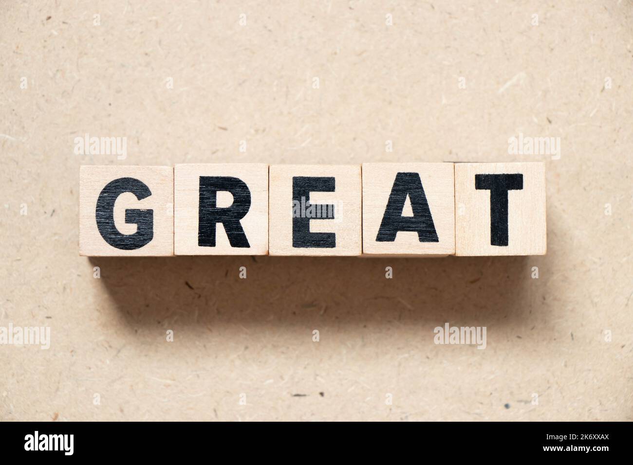 Alphabet letter block in word great on wood background Stock Photo - Alamy