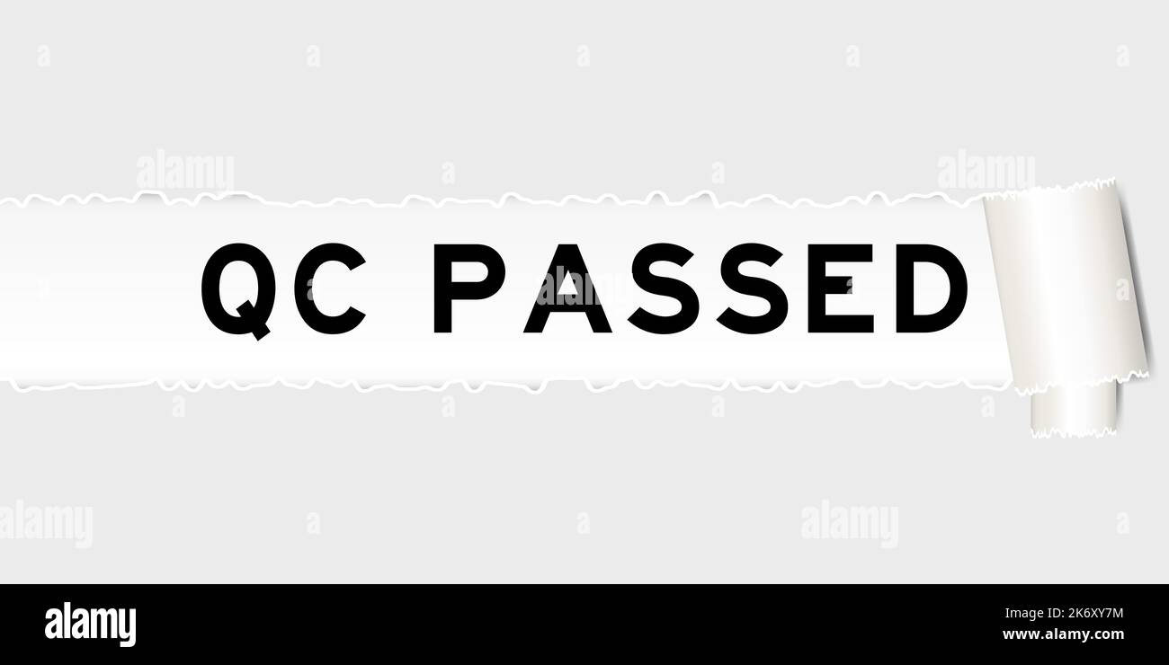 Ripped gray paper background that have word QC (quality control) passed ...